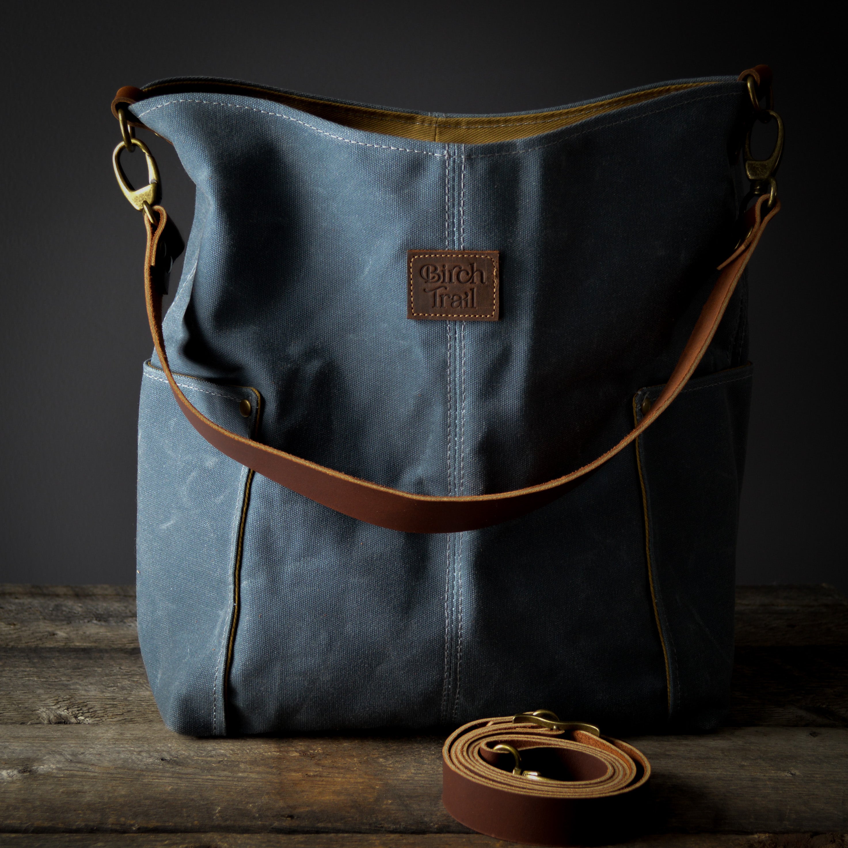 Waxed Canvas Compass Bag in blue slate handcrafted by Birch Trail
